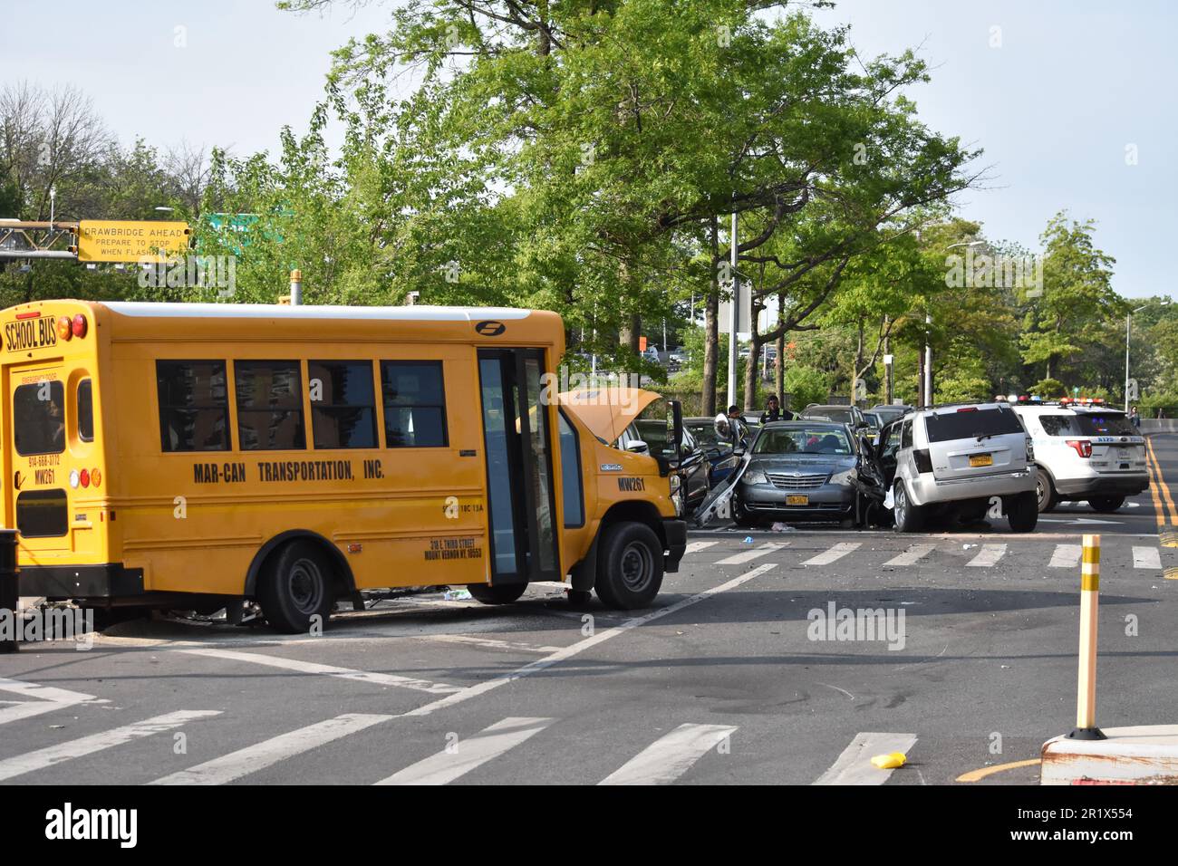 School bus involved in an accident left with a gaping hole and extreme ...