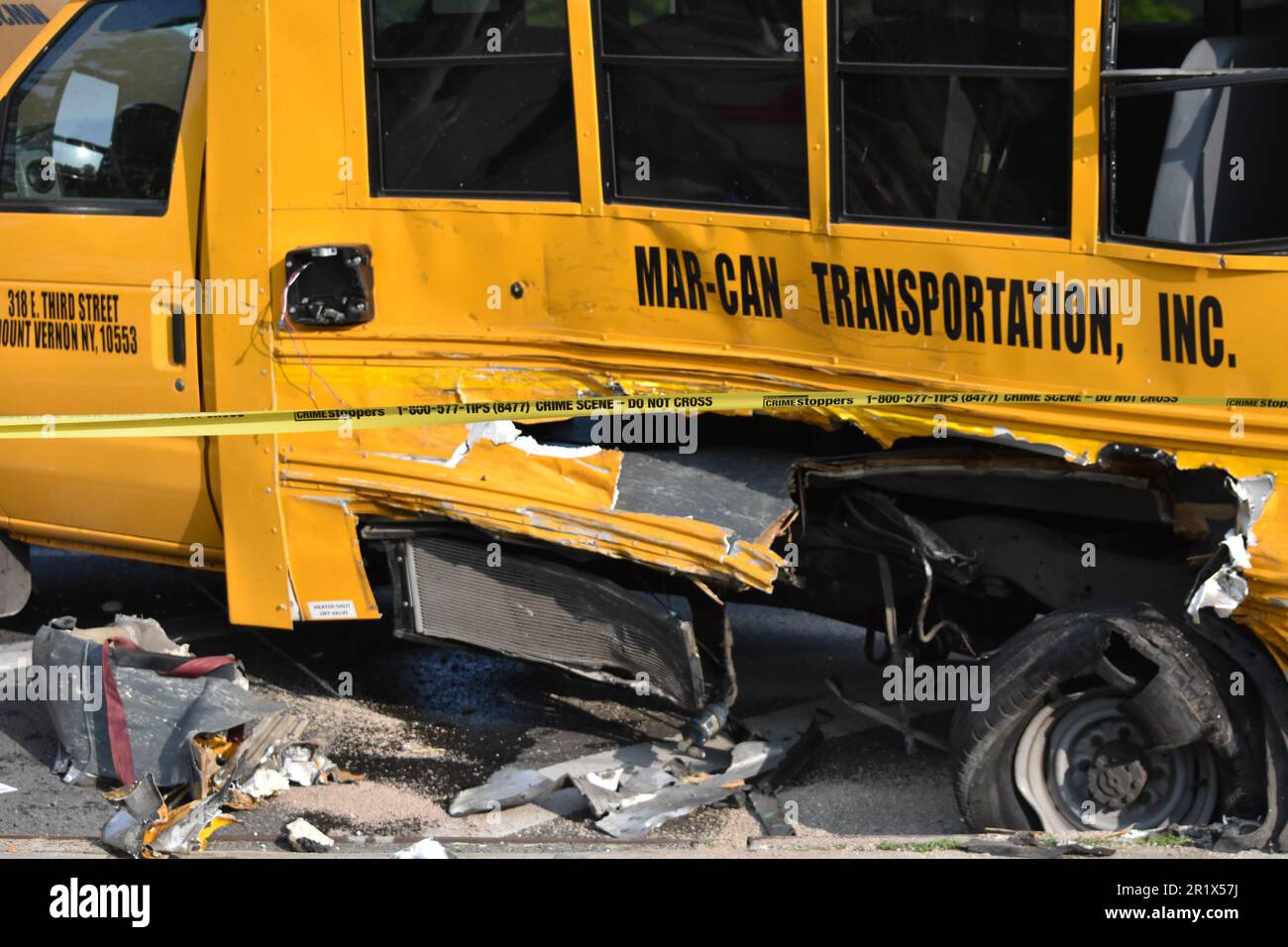 School bus involved in an accident left with a gaping hole and extreme ...