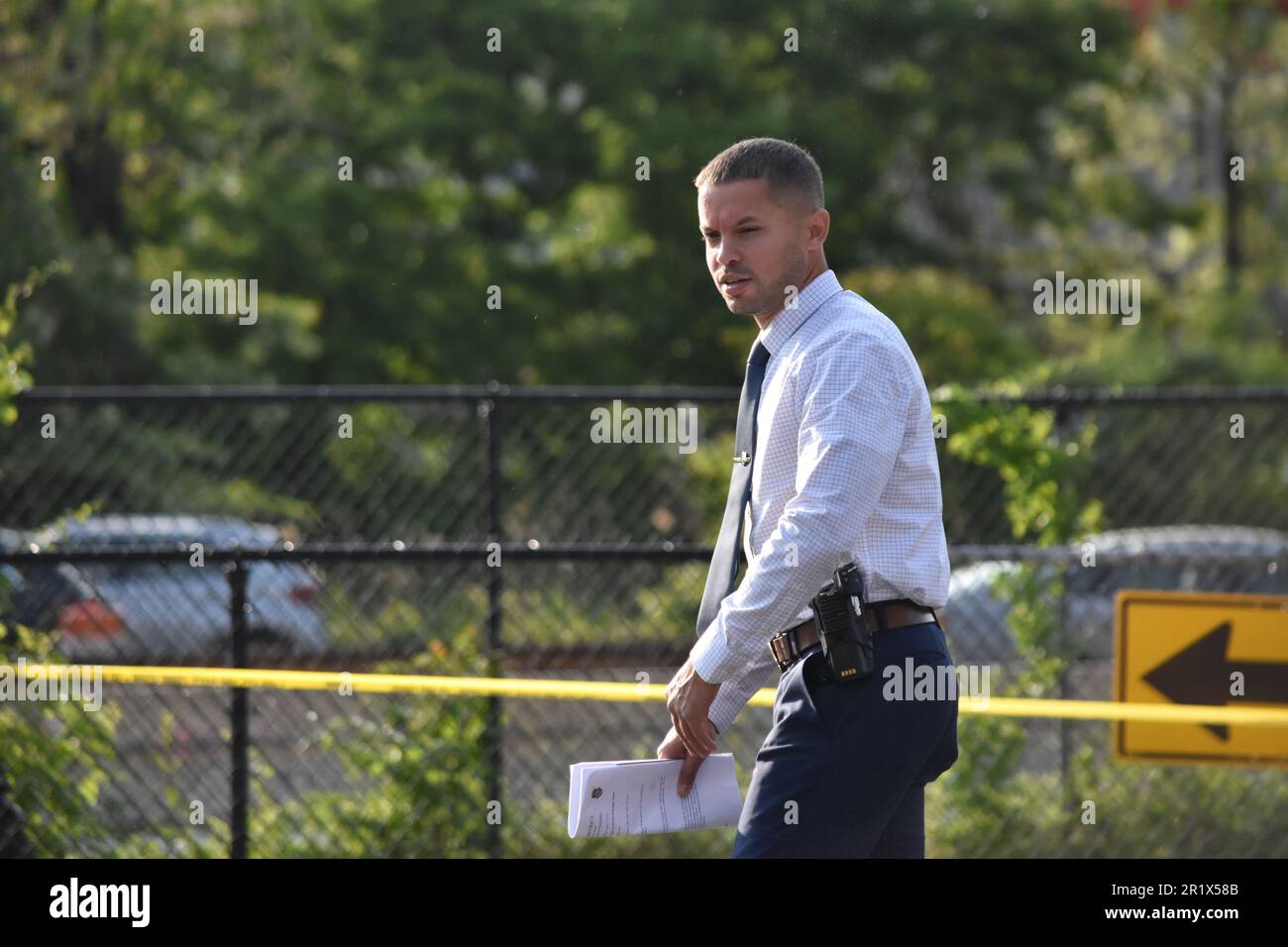 An Investigator examines the crime scene. Multiple people were hurt in ...