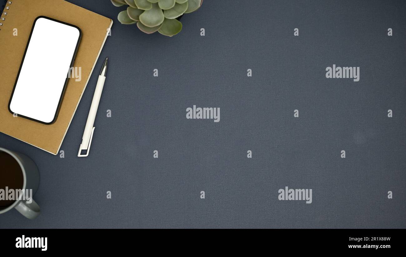 Workspace top view, flat lay, with smartphone white screen mockup, pen ...