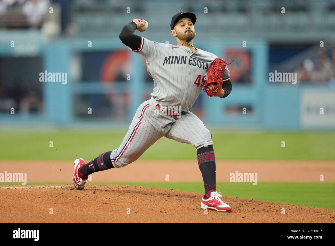 Minnesota Twins starting pitcher Pablo Lopez (49) throws during the ...