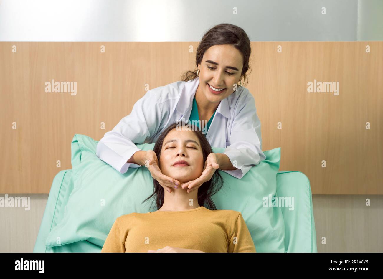 Female doctor or dermatologist examining skin for facial treatment for ...