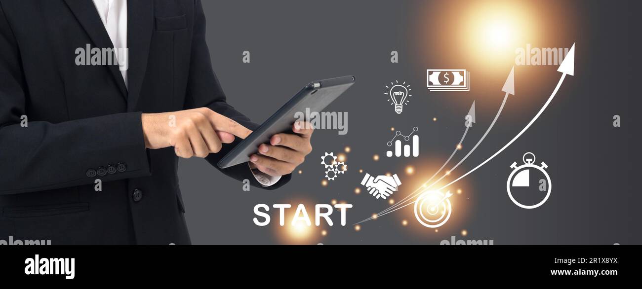 Businessman in suit touching on tablet computer monitor. Startup ...