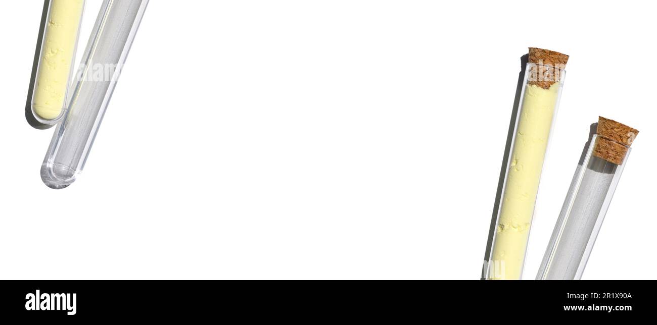 Sulfur Powder in test tube with cork cap. Closeup chemical ingredient ...