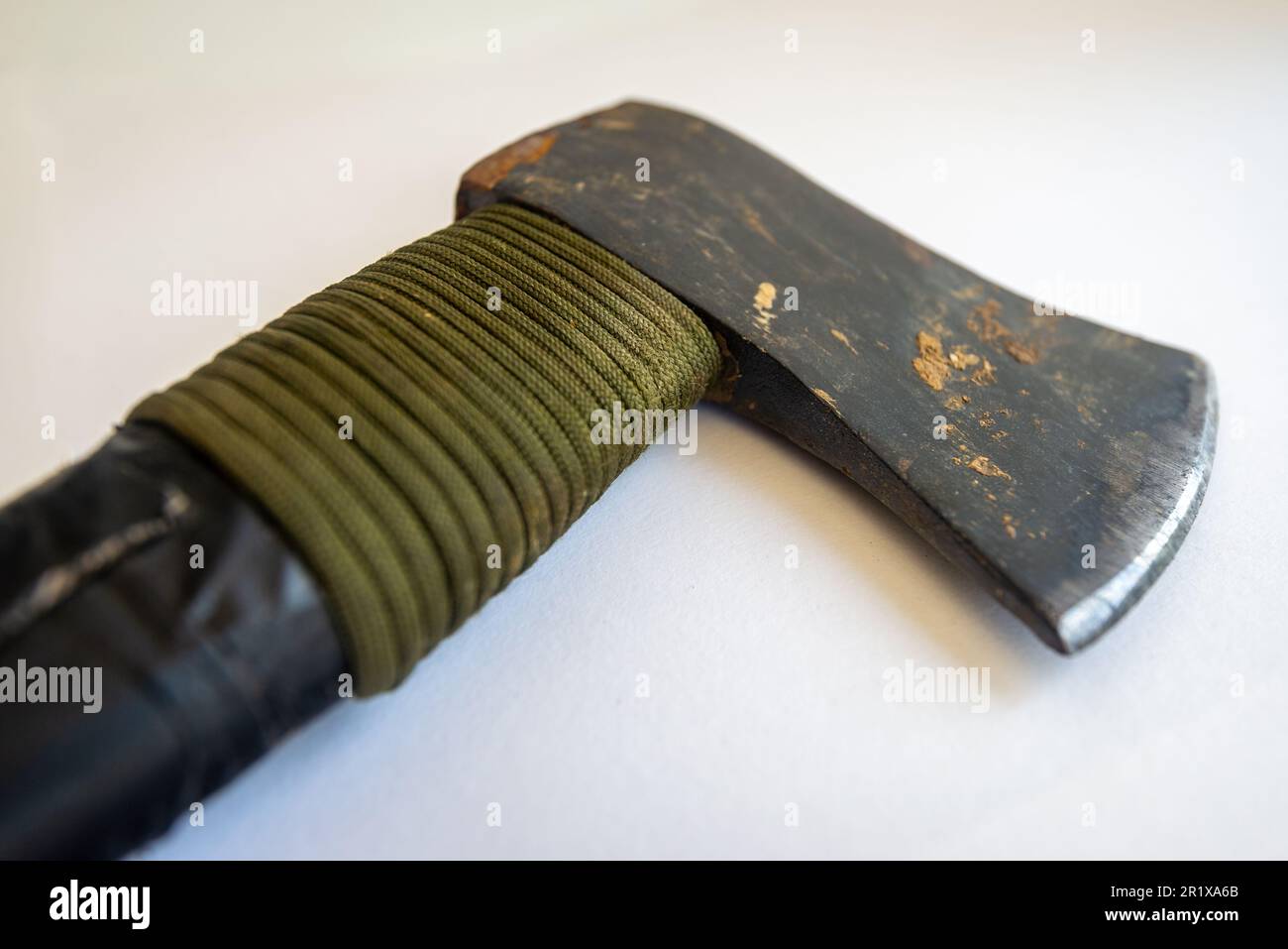 Old, used axe head close up with soil and rust blade. Isolated on white ...