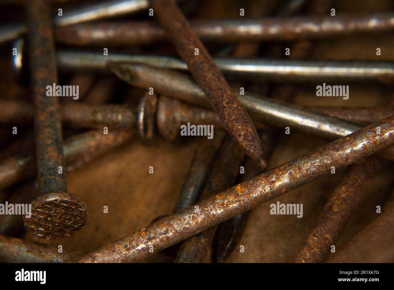 old rusty, 16 penny nails, pile of heavy penny nails for construction ...