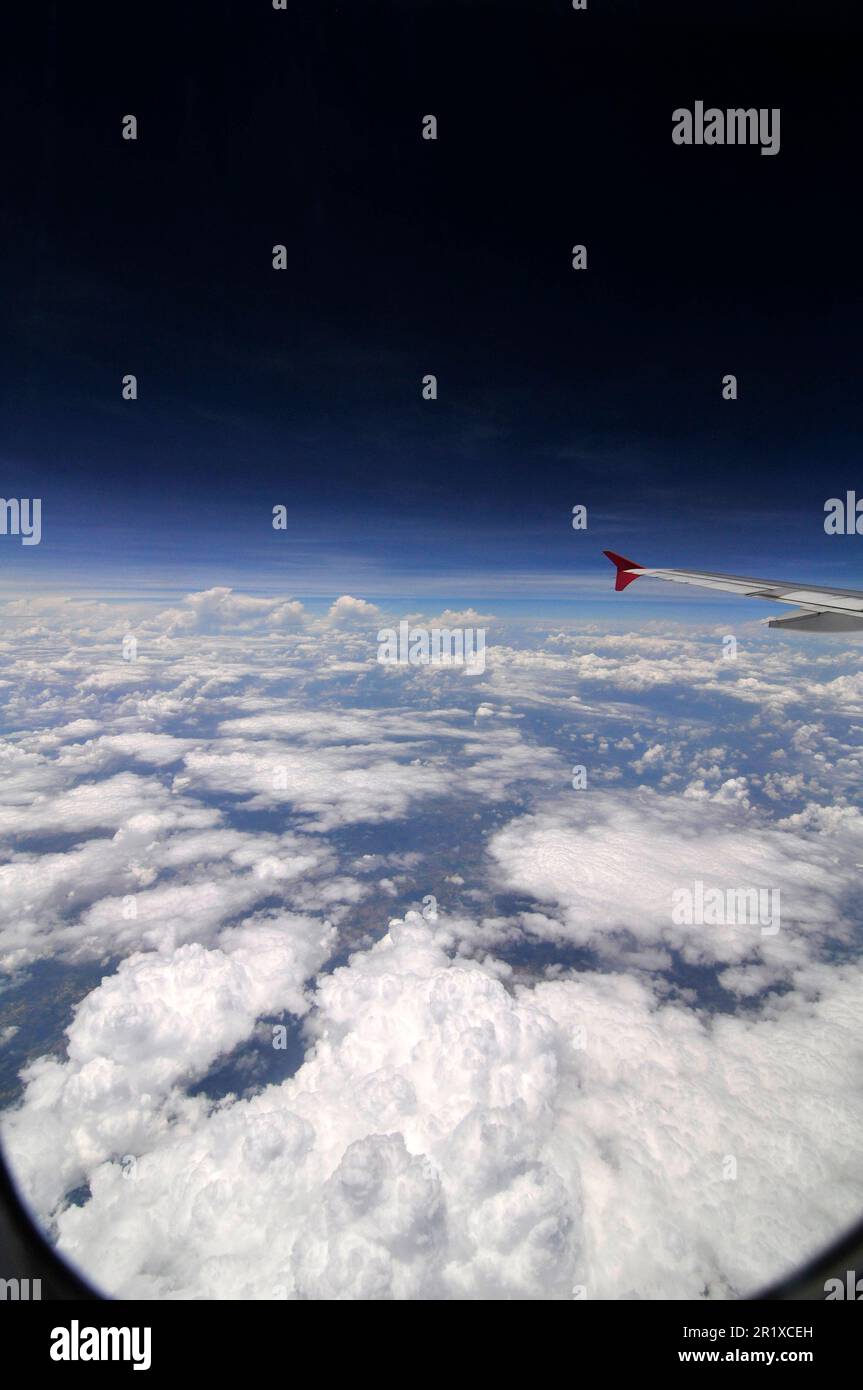 Flying over clouds aerial hi-res stock photography and images - Alamy