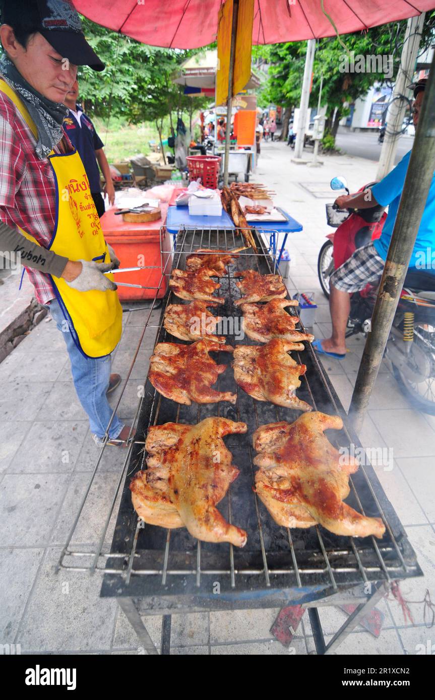 Street food vendor selling chicken hi-res stock photography and images ...