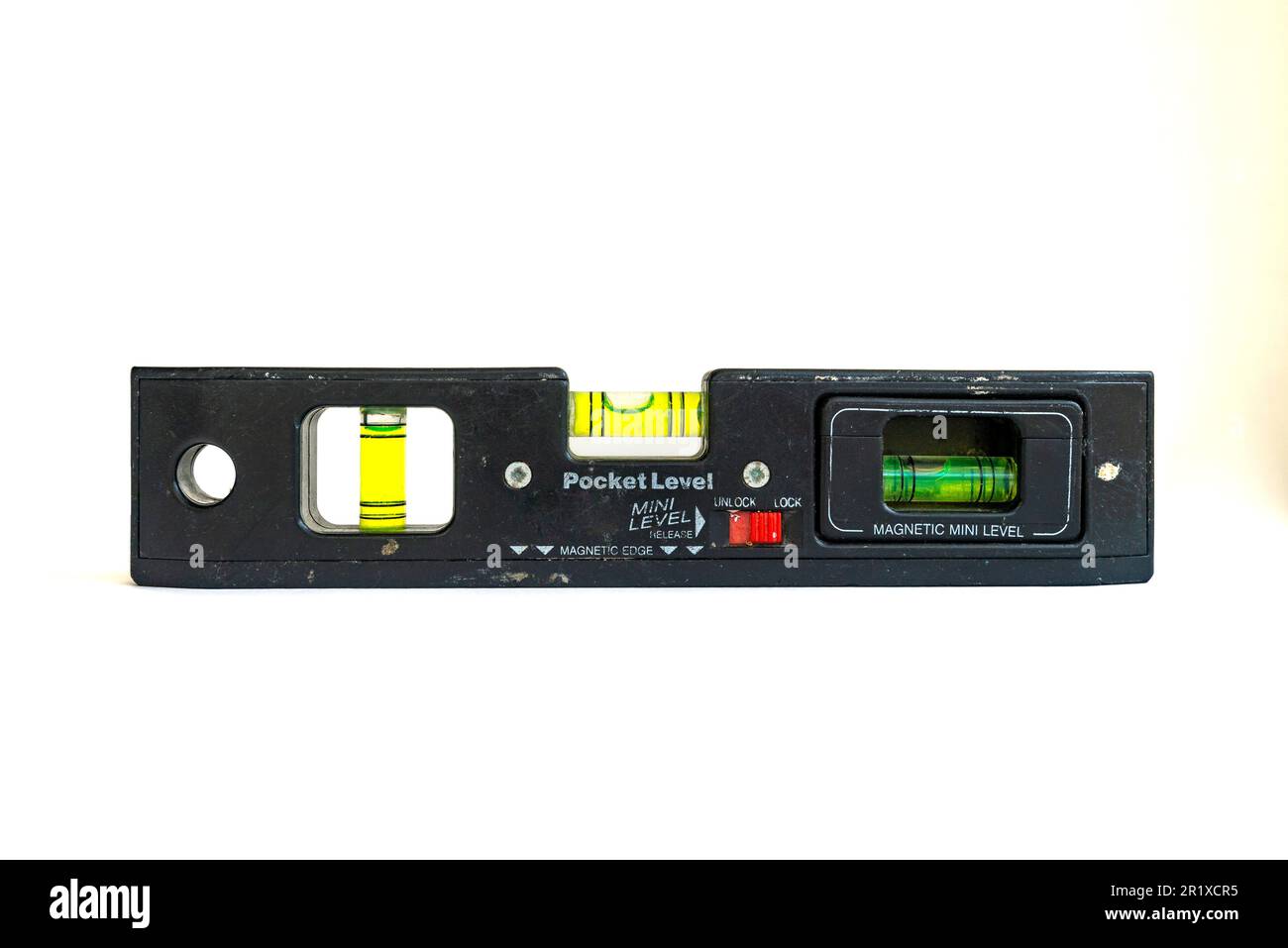 Small, mini, pocket sized spirit level. Isolated on white background ...