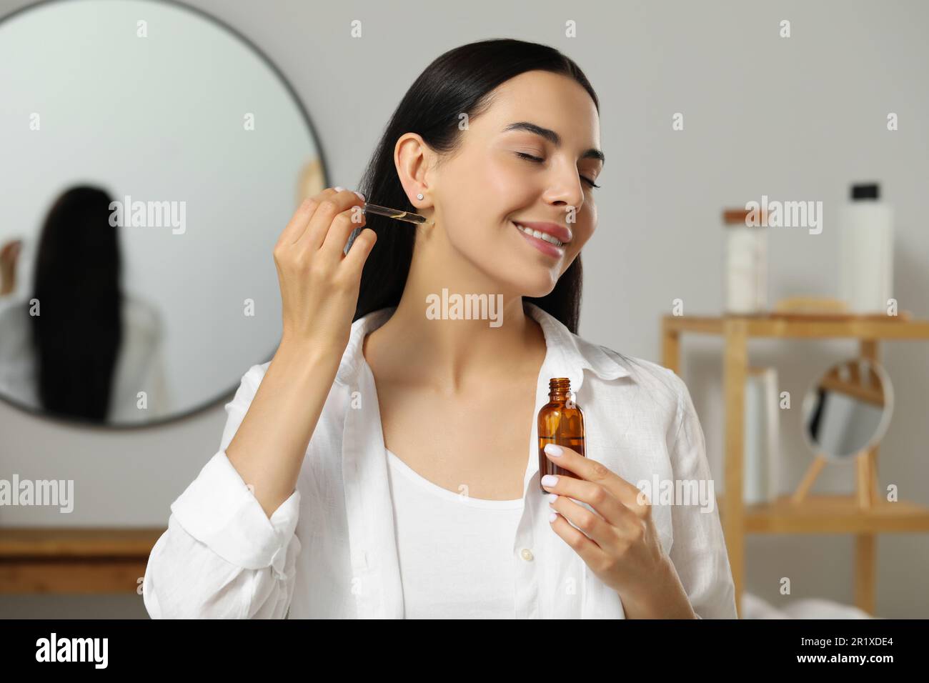 Apply oil to neck hi-res stock photography and images - Alamy