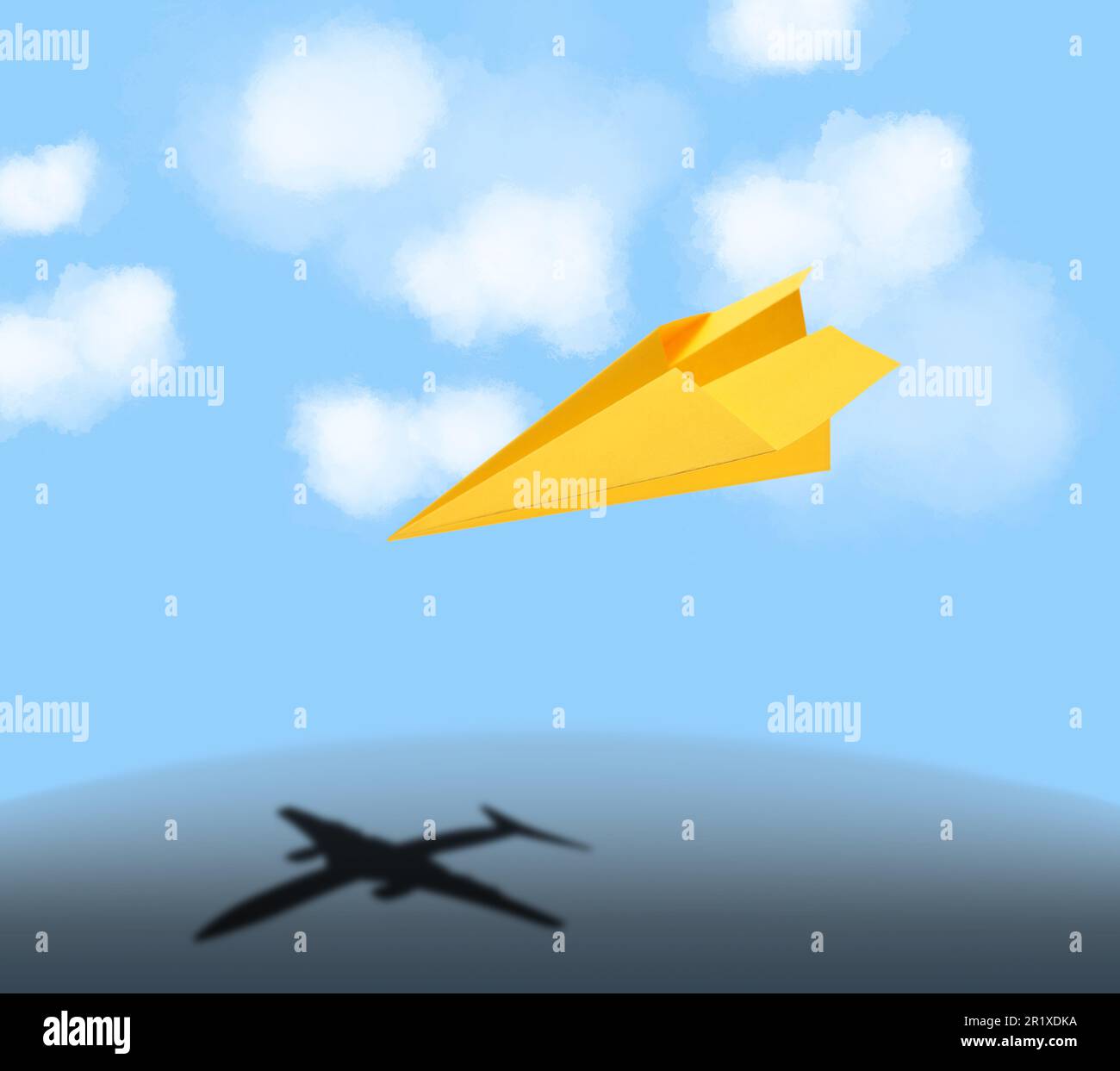 Flying paper plane and shadow of a real airplane Stock Photo - Alamy