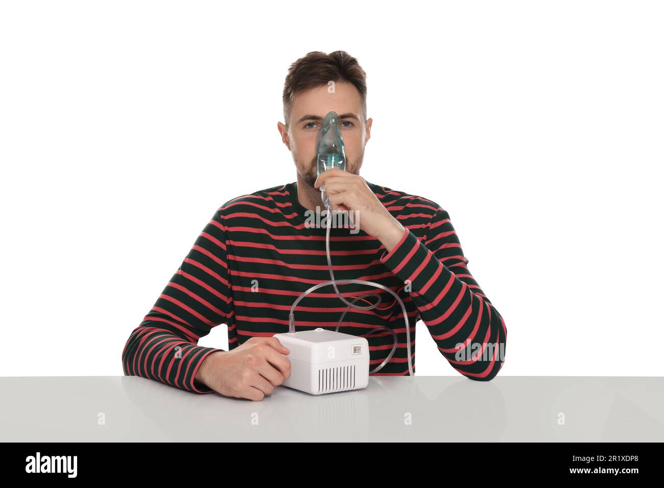 Young man using nebulizer hi-res stock photography and images - Alamy