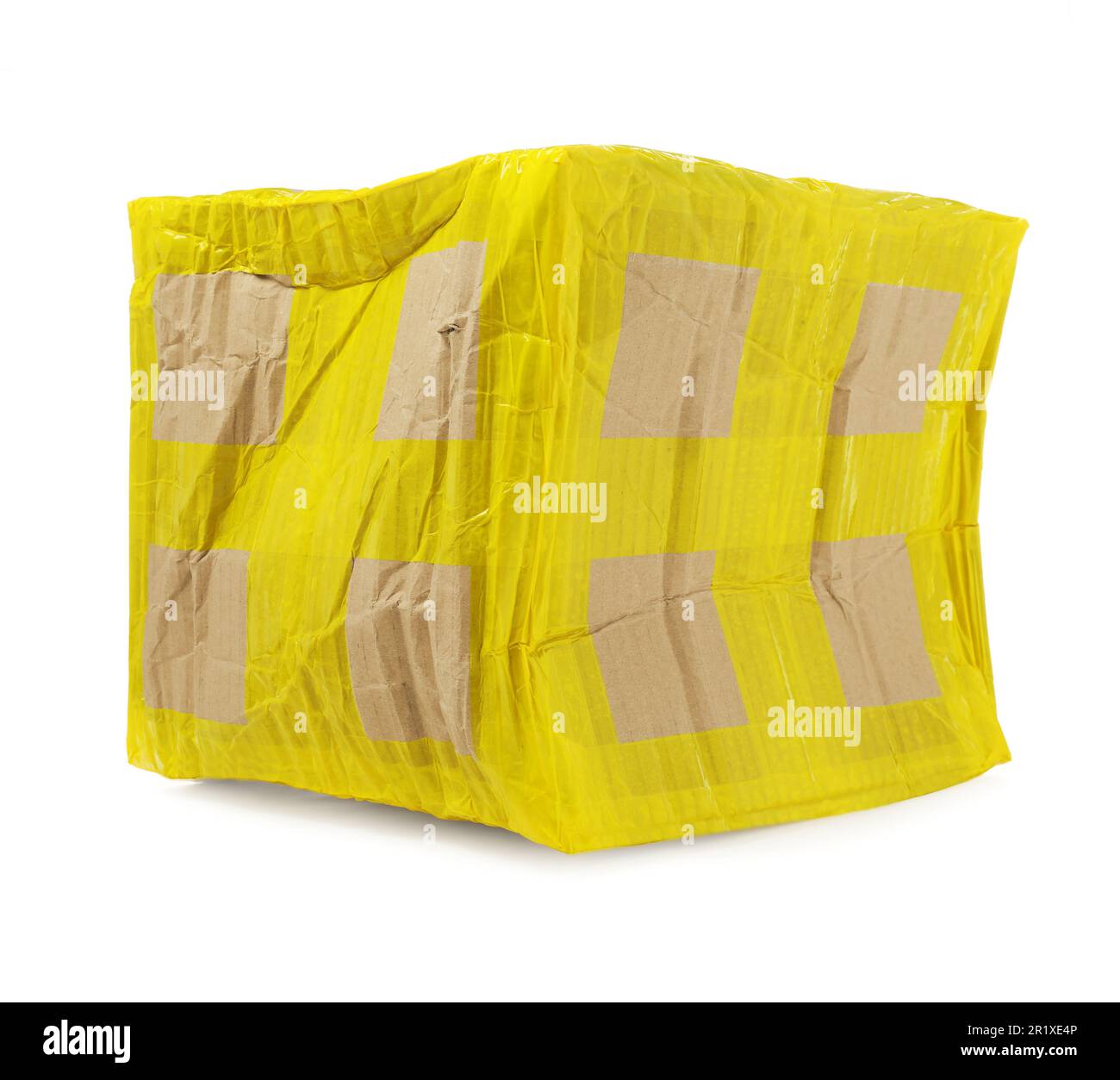 Crumpled cardboard parcel box with yellow sticky tape on white ...