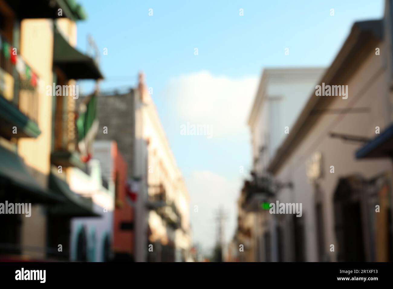 Blurred view of city street with old buildings Stock Photo - Alamy
