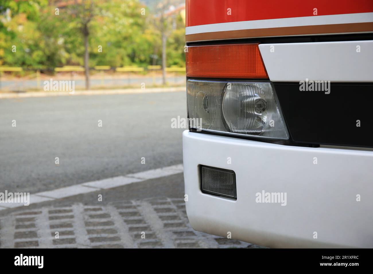 Modern bus on autumn day outdoors, closeup and space for text. Public ...