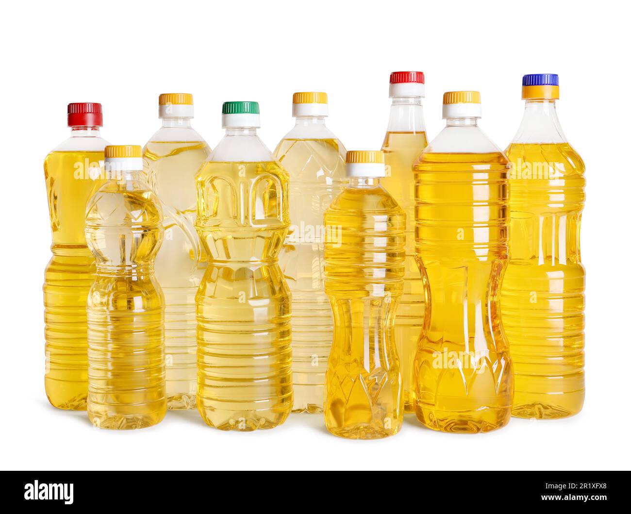 Bottles of cooking oil on white background Stock Photo - Alamy