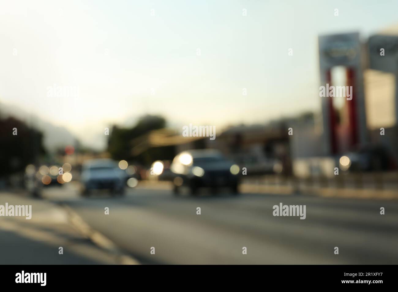 Blurred view of road with cars, bokeh effect Stock Photo - Alamy