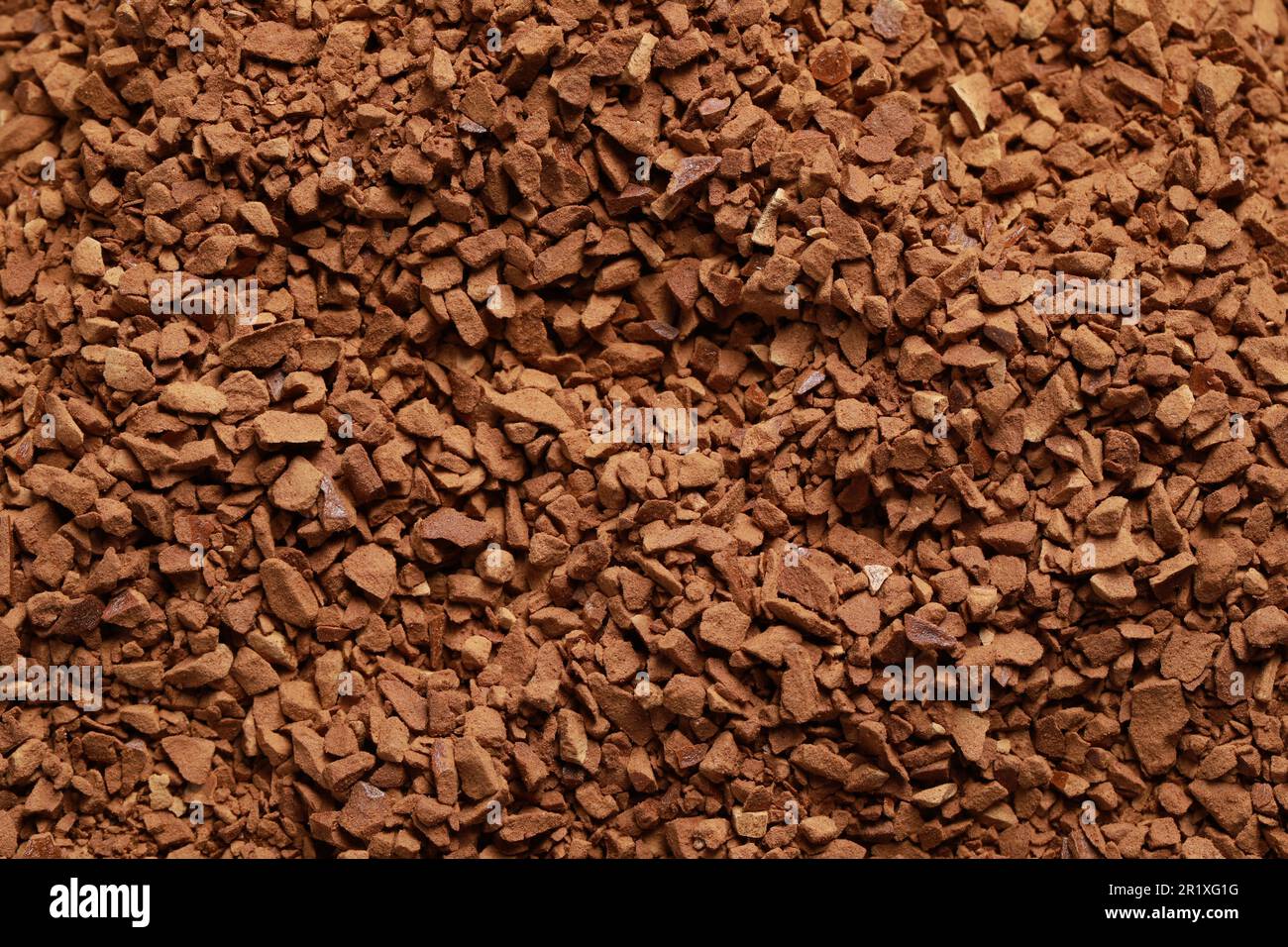 Dry instant coffee as background, top view Stock Photo - Alamy
