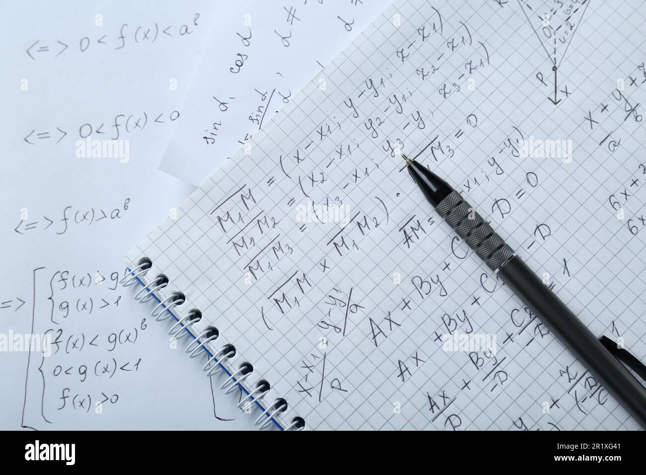 Notebook with different mathematical formulas and pen, top view Stock ...
