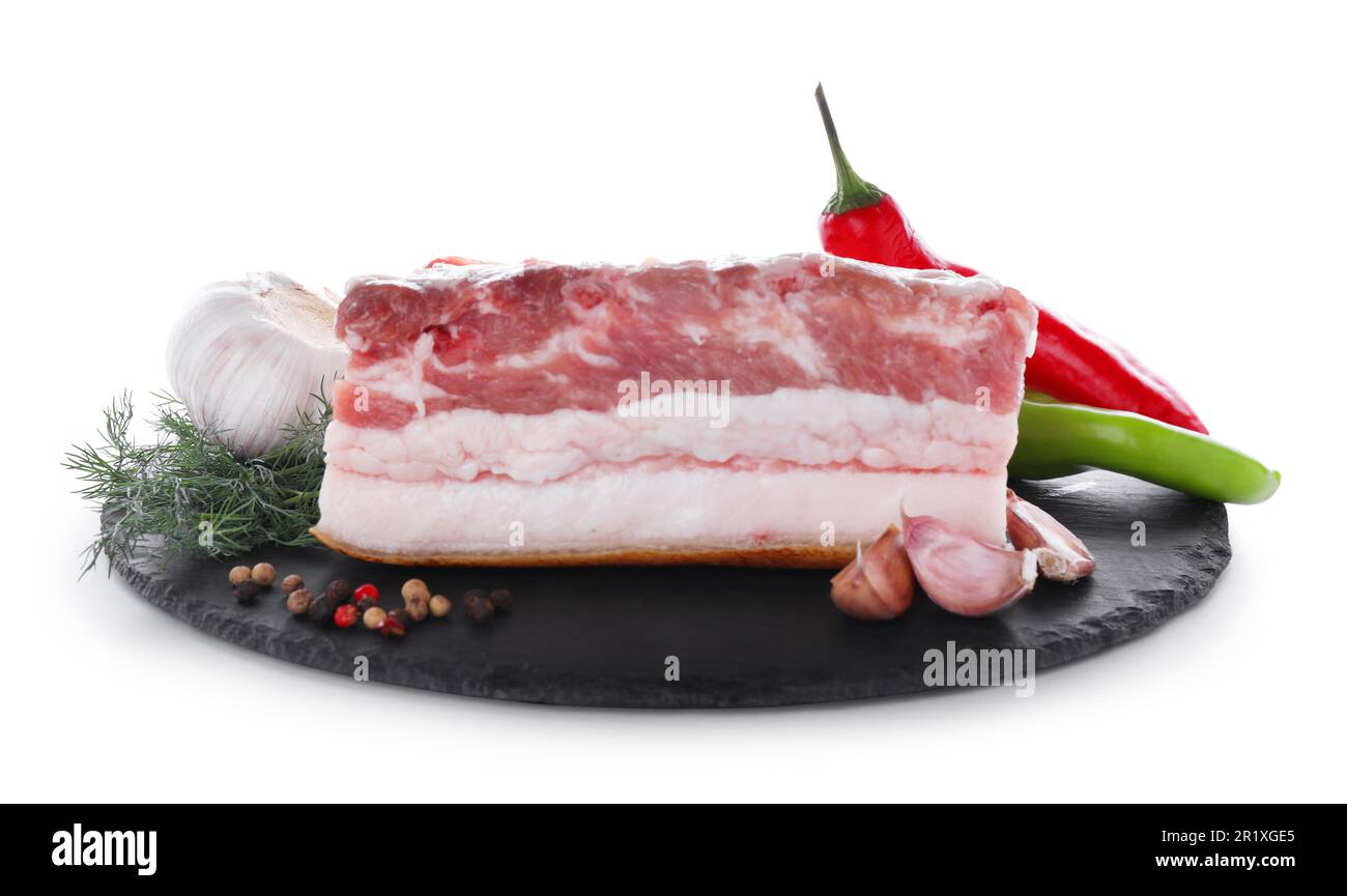 Piece of pork fatback served with different ingredients isolated on ...