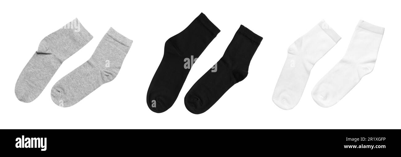 Set with different socks on white background. Banner design Stock Photo ...