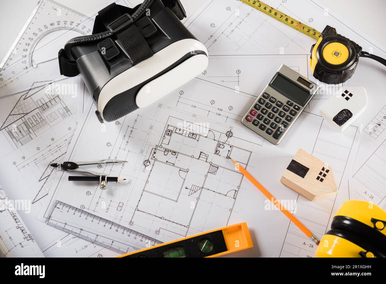 Architectural blueprint paper project plans on desk table Stock Photo ...