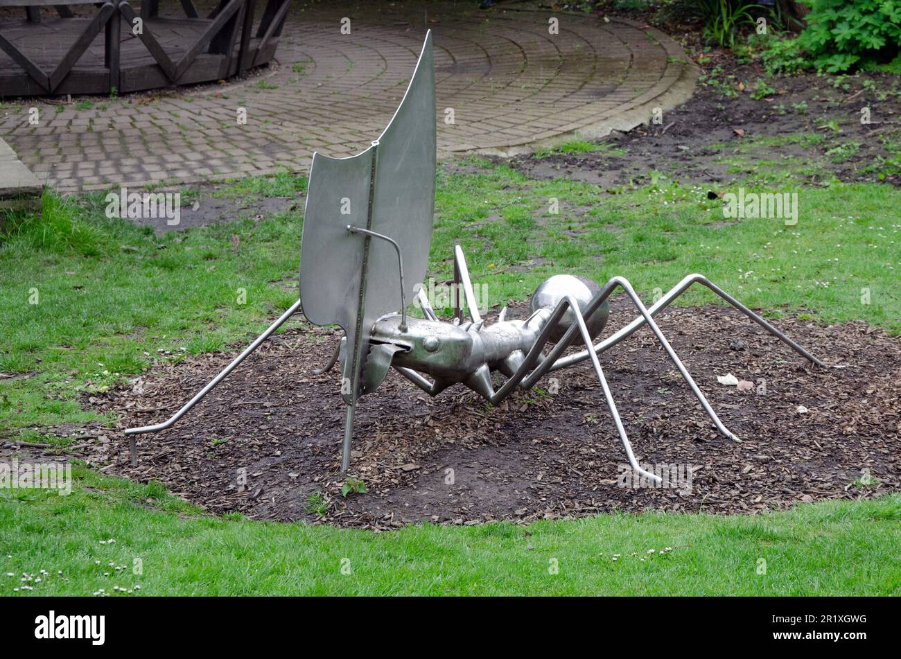 Photo of a stainless steel leaf cutting ant sculpture with green filed ...