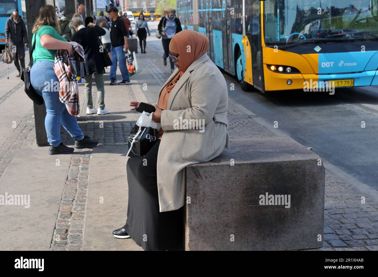May 15,2023/ Public waiting at public bus stop in danish capital ...