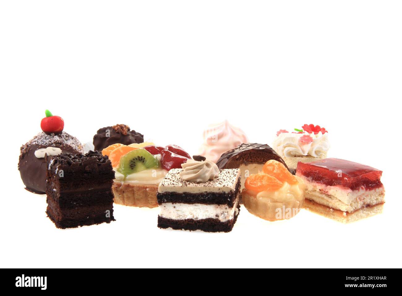 sweet color desserts isolated on the white background Stock Photo - Alamy