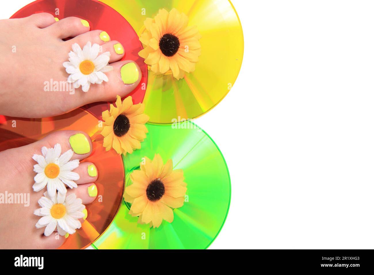 women feets and flowers as nice pedicure background Stock Photo - Alamy
