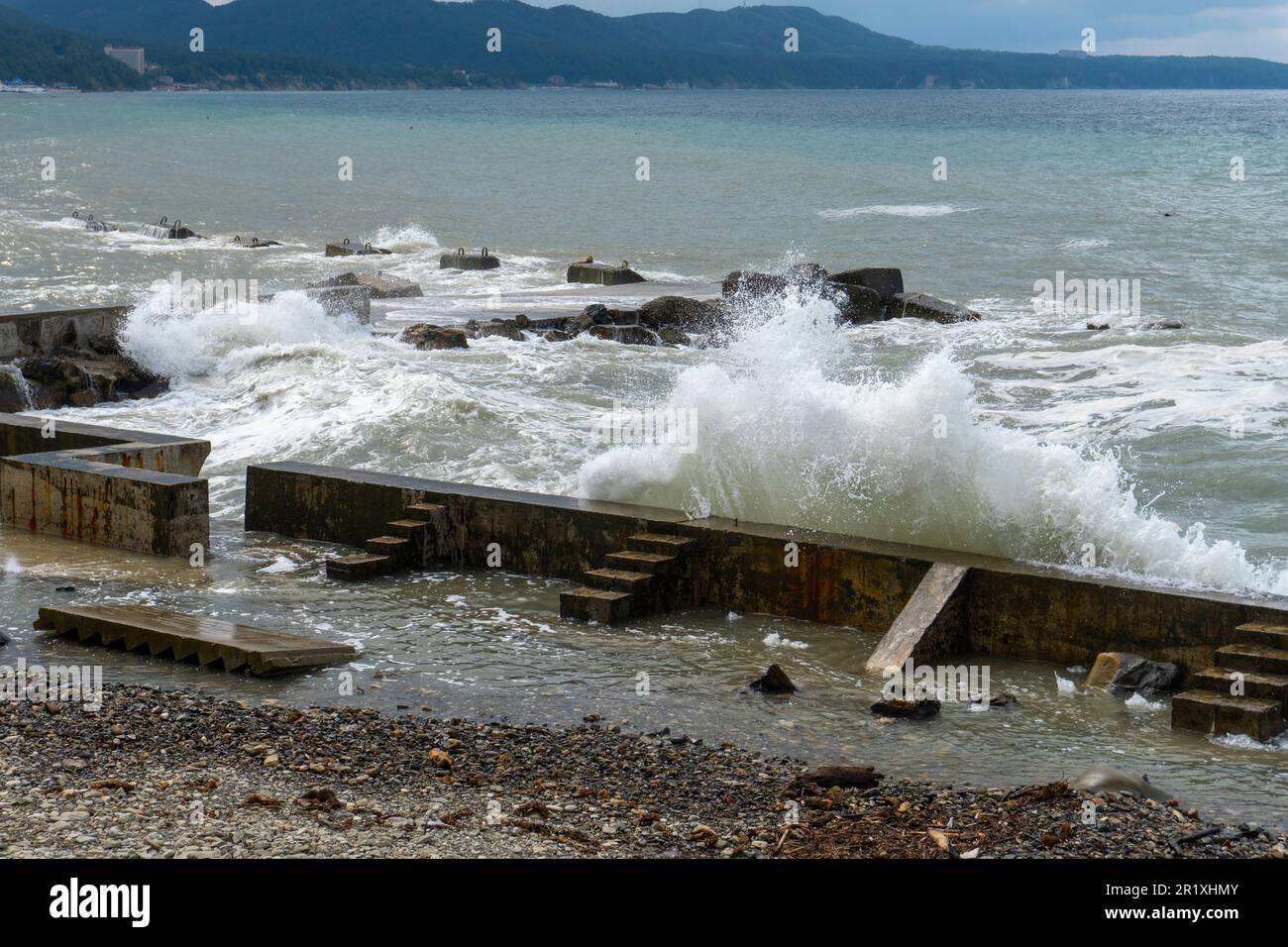 small storm on the sea, waves hitting the shore Stock Photo - Alamy