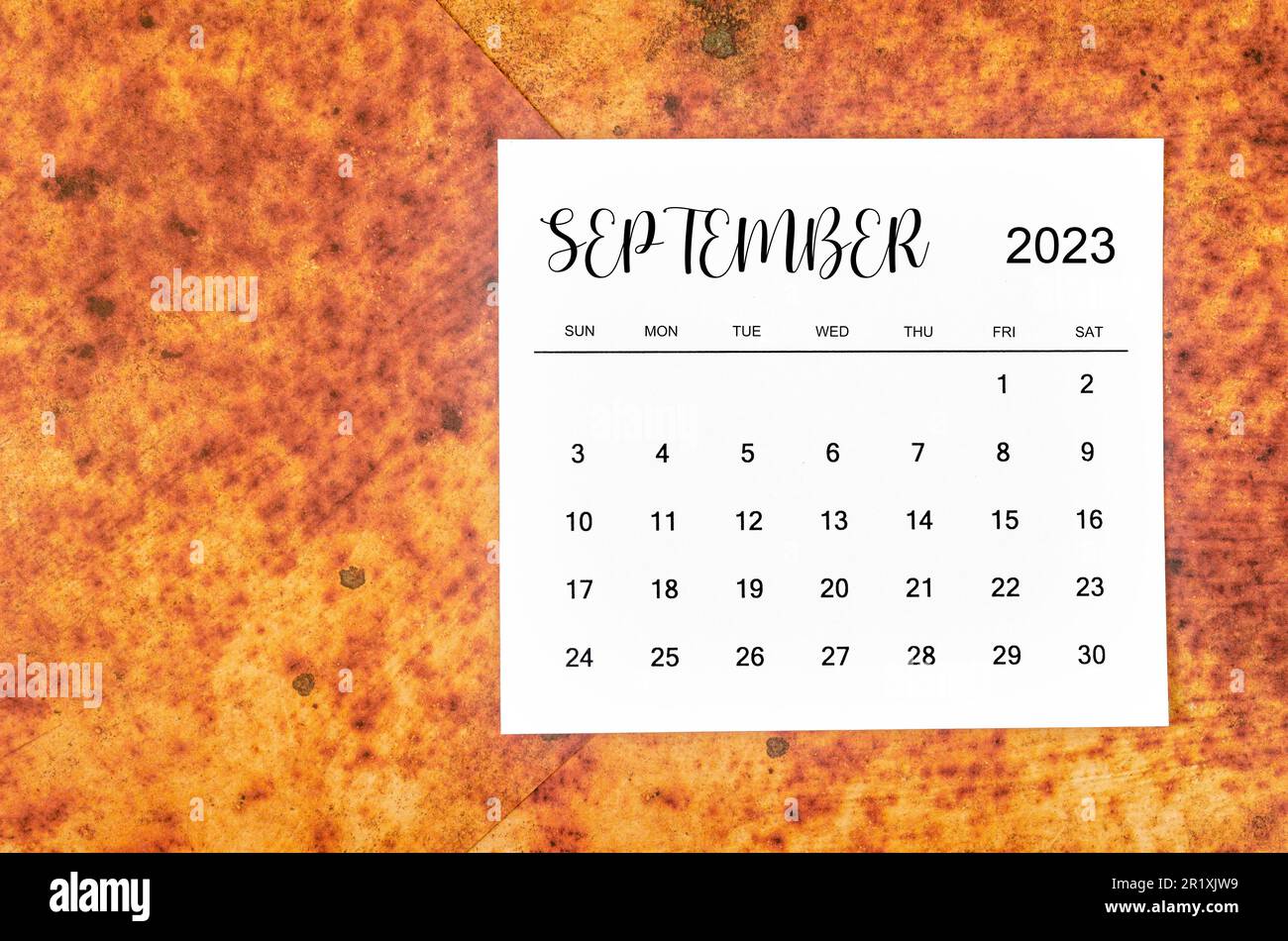 September 2023 Monthly calendar for 2023 year on red grunge background ...