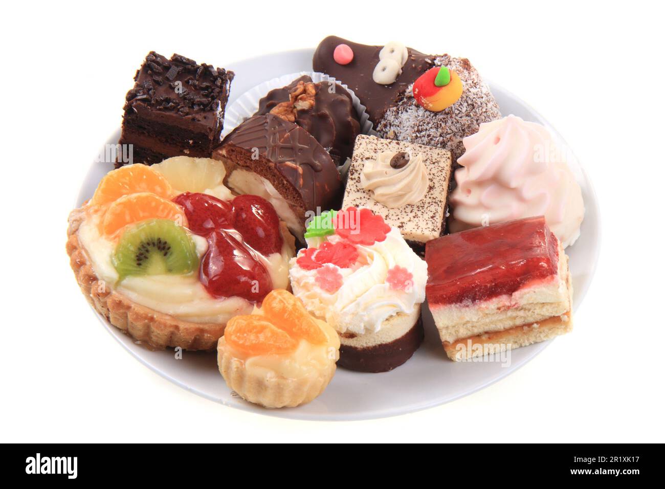 sweet color desserts isolated on the white background Stock Photo - Alamy