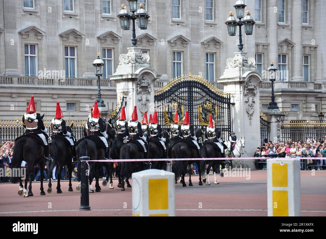 The Buckingham Palace in London, England, with a Changing of the Guards ...
