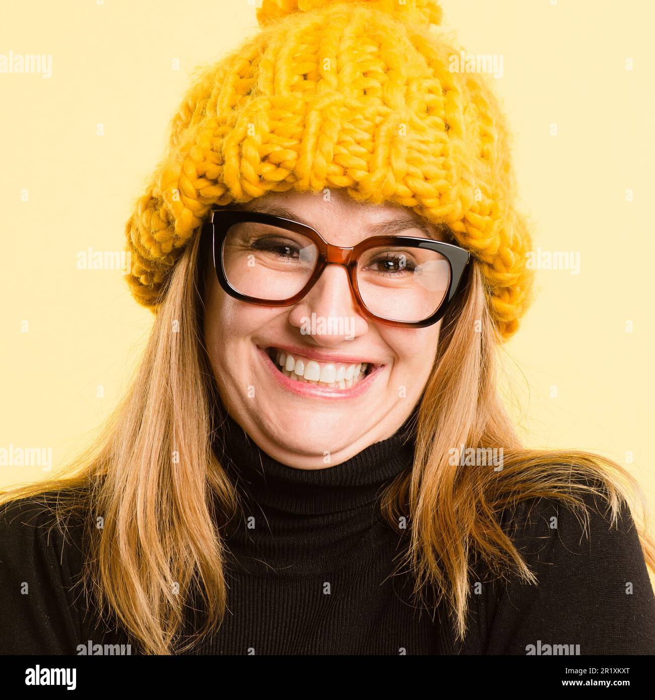 Accept your inner nerd. an attractive young woman standing alone in the ...