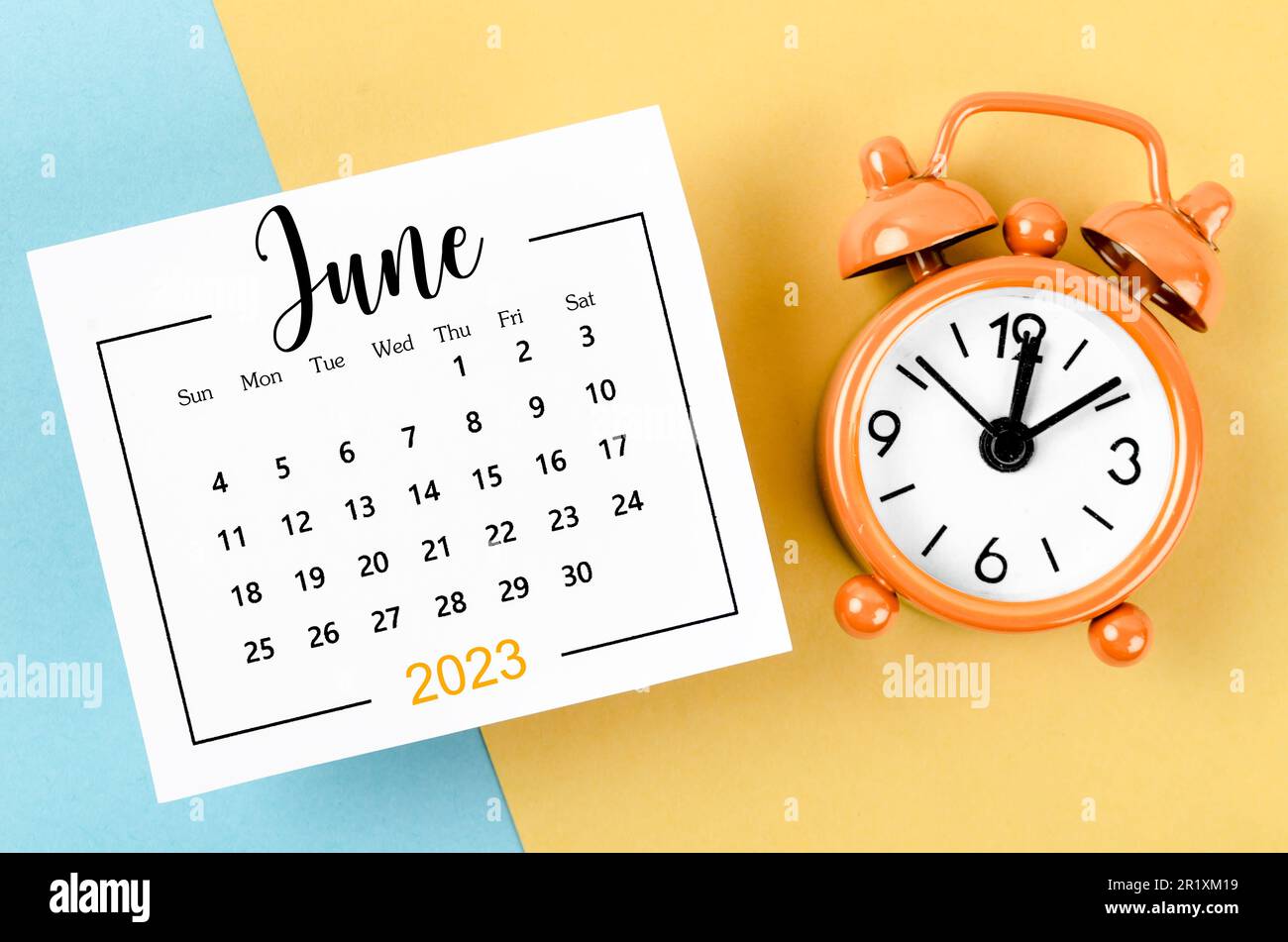 June 2023 Monthly calendar for 2023 year with alarm clock on beautiful ...