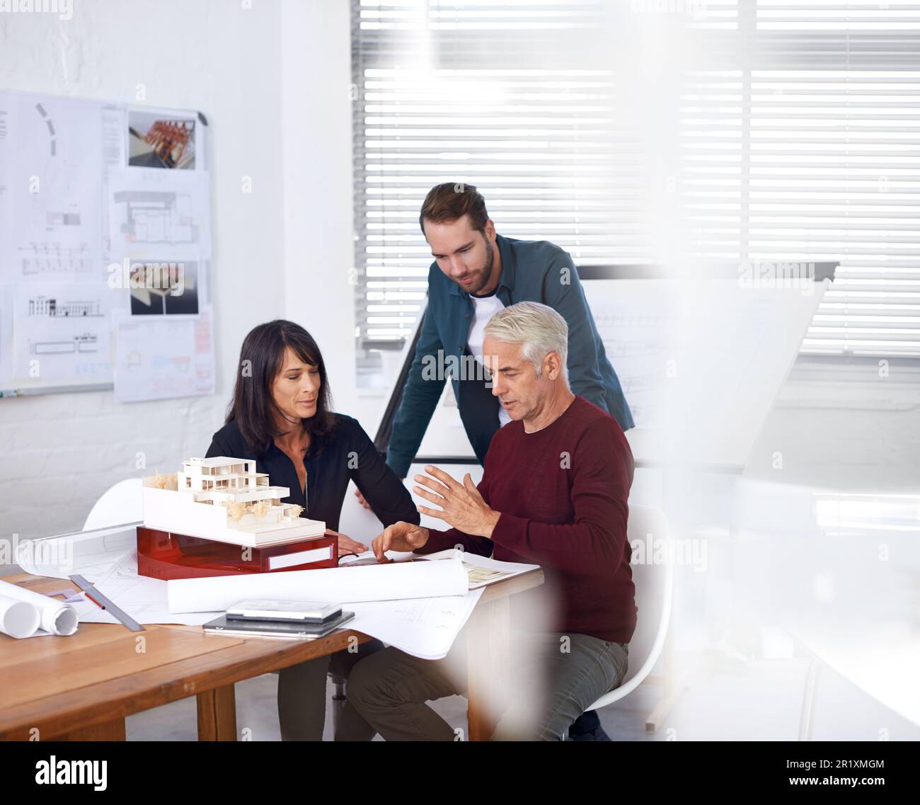 Creative architects talking new building hi-res stock photography and ...
