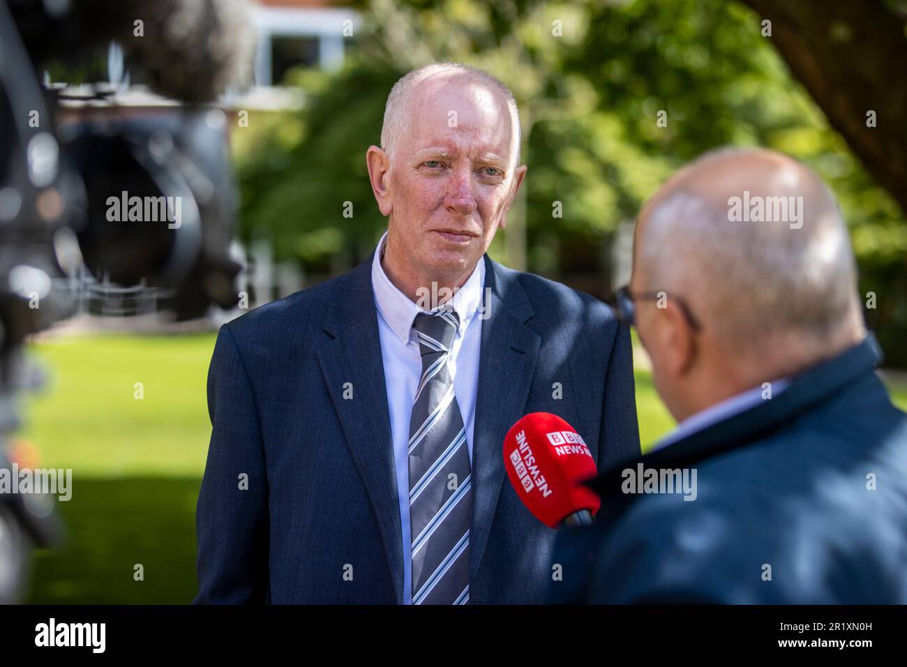 Paul Crawford speaks to the media outside Queens University Belfast ...