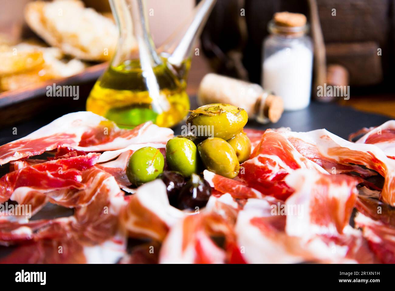 Spanish tapa of Iberian ham. Iberian ham is a type of serrano ham from ...