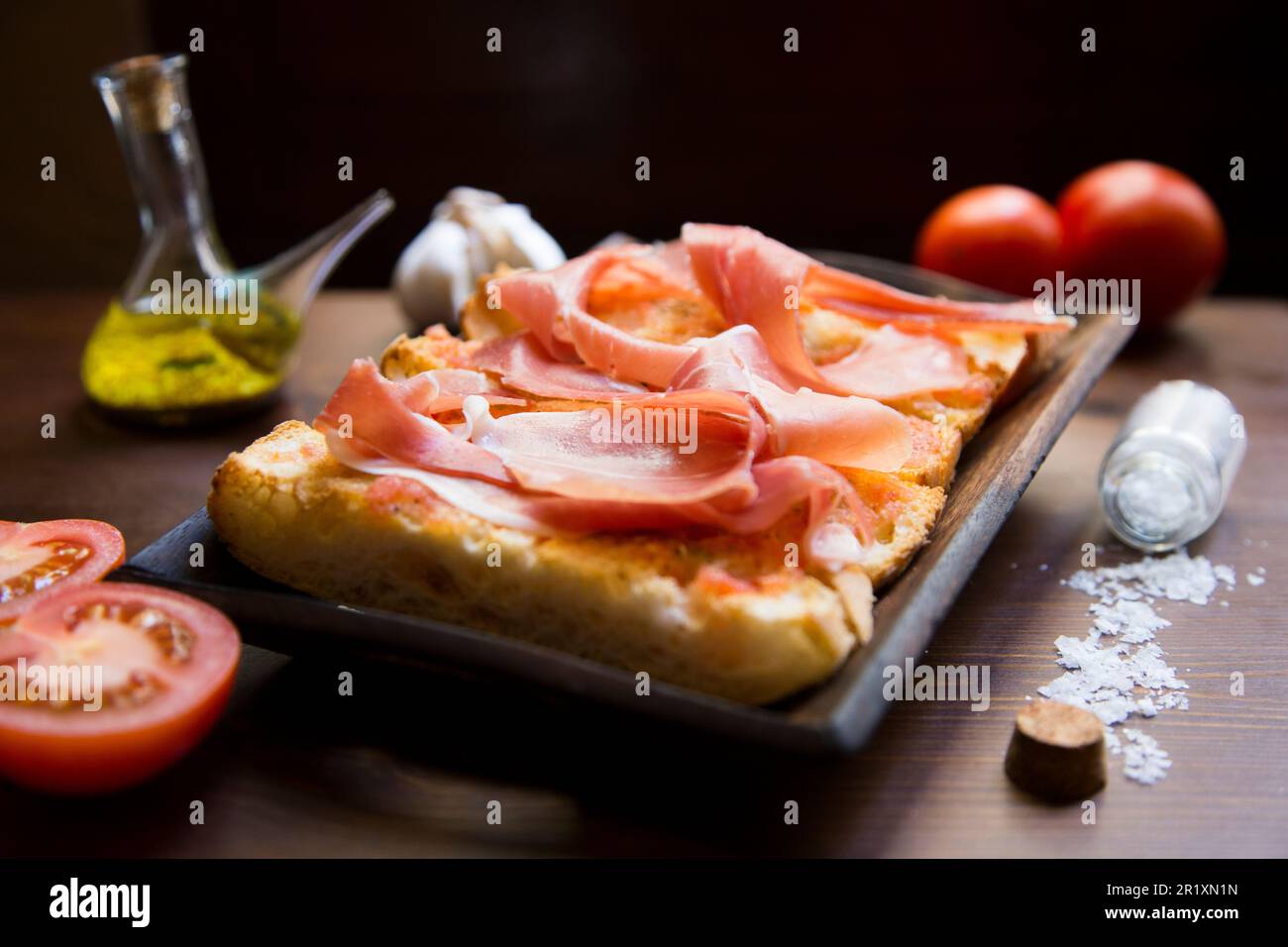 Spanish tapa of Iberian ham. Iberian ham is a type of serrano ham from ...