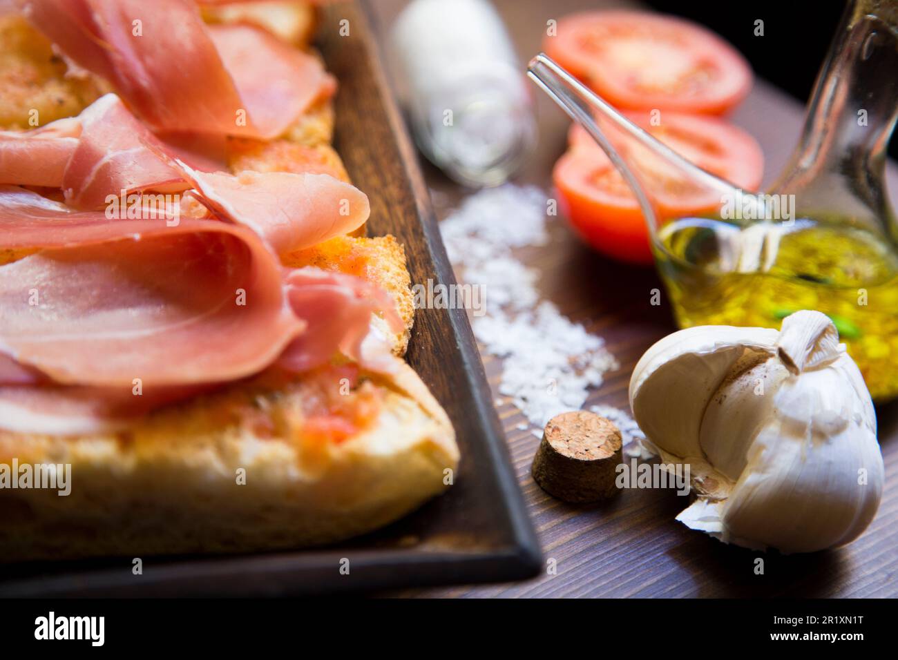 Spanish tapa of Iberian ham. Iberian ham is a type of serrano ham from ...