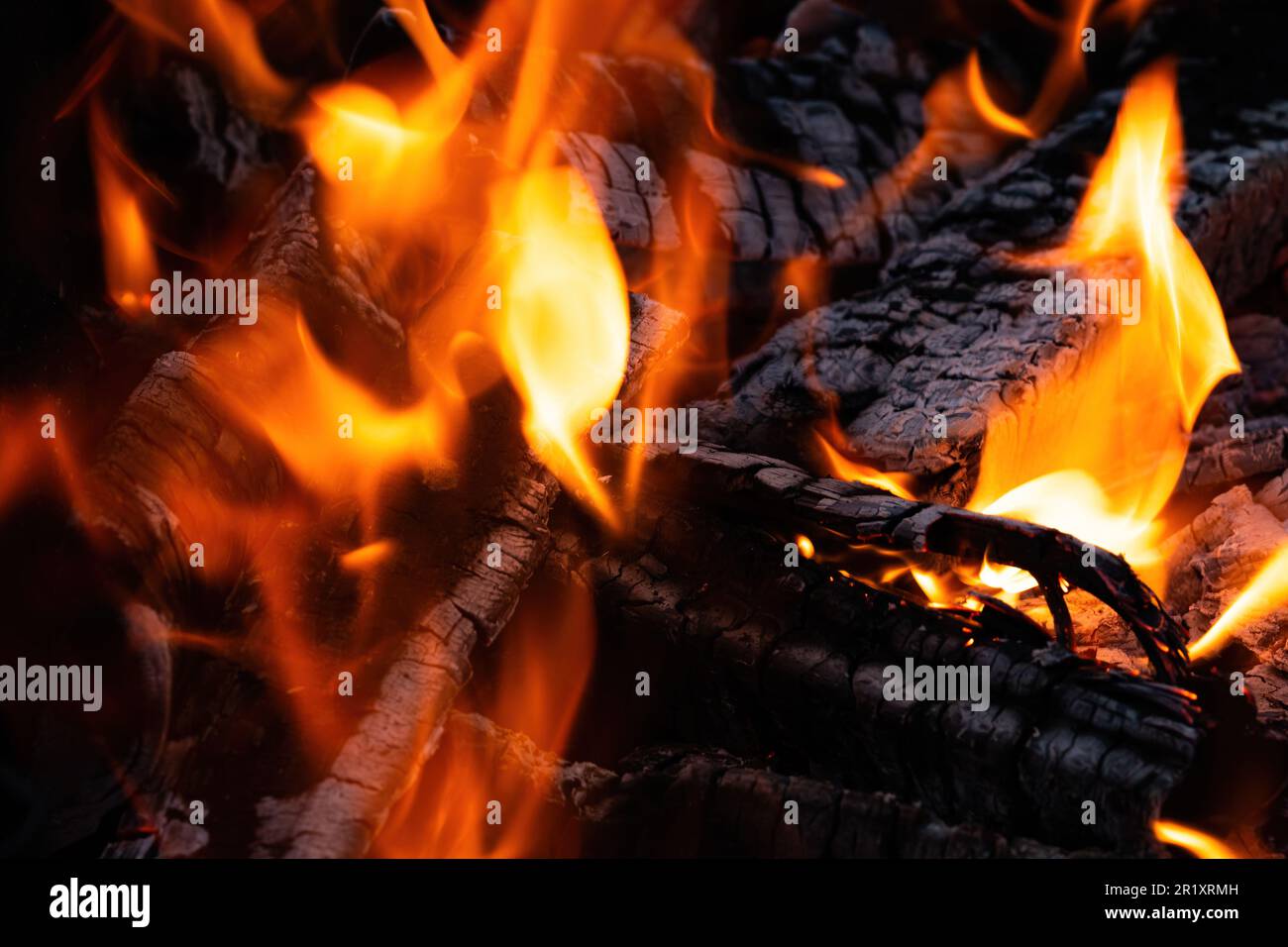 Burning fire flames and charred firewood. Natural heat energy Stock ...