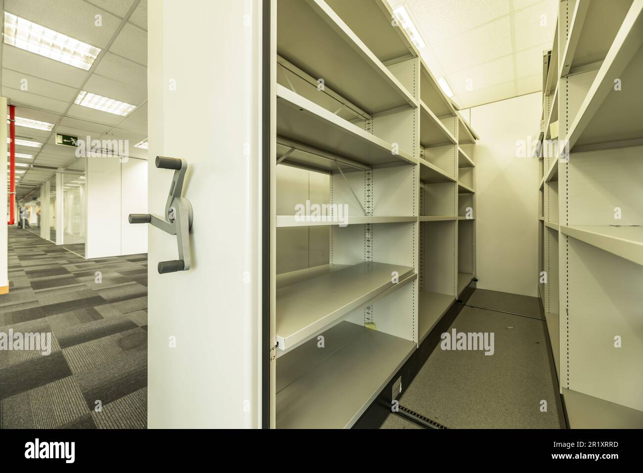 Office shelves with swivel wheel to move them and access the files ...