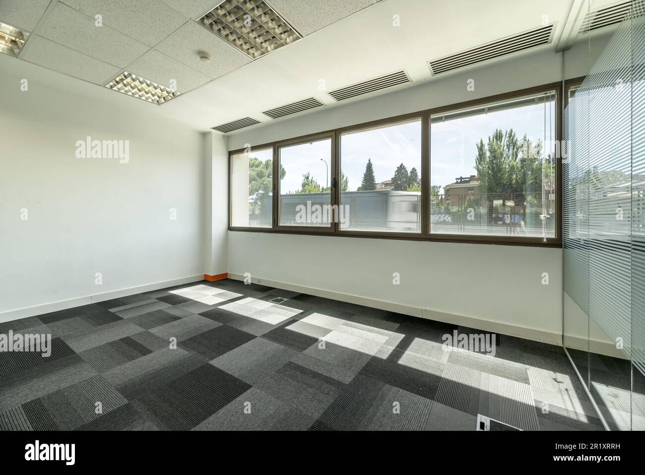 empty offices with separate offices with glass partitions, large ...