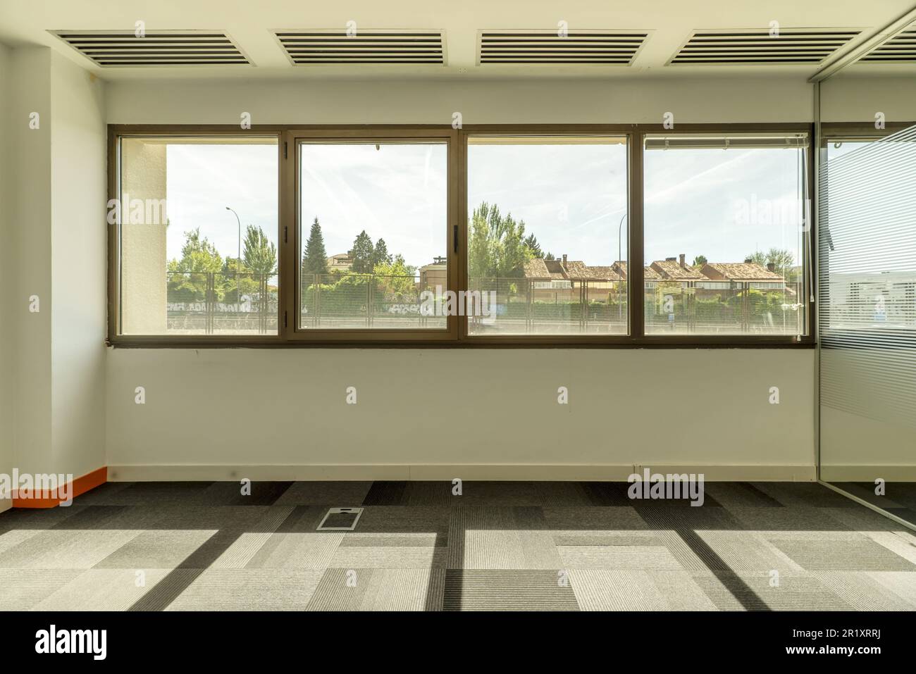 empty offices with separate offices with glass partitions, large ...
