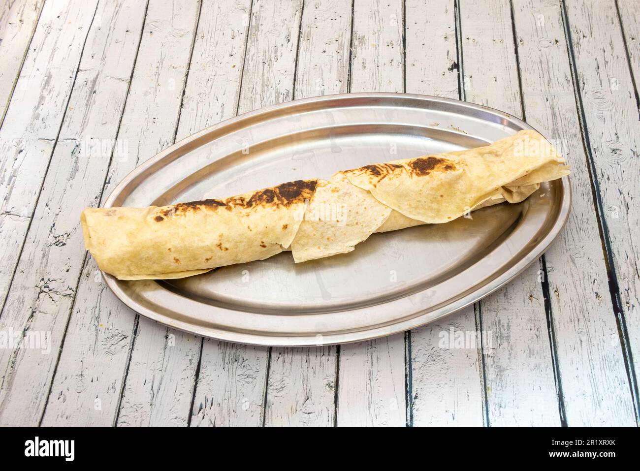 A durum is a way of presenting the doner rolled in a flatbread, widely ...