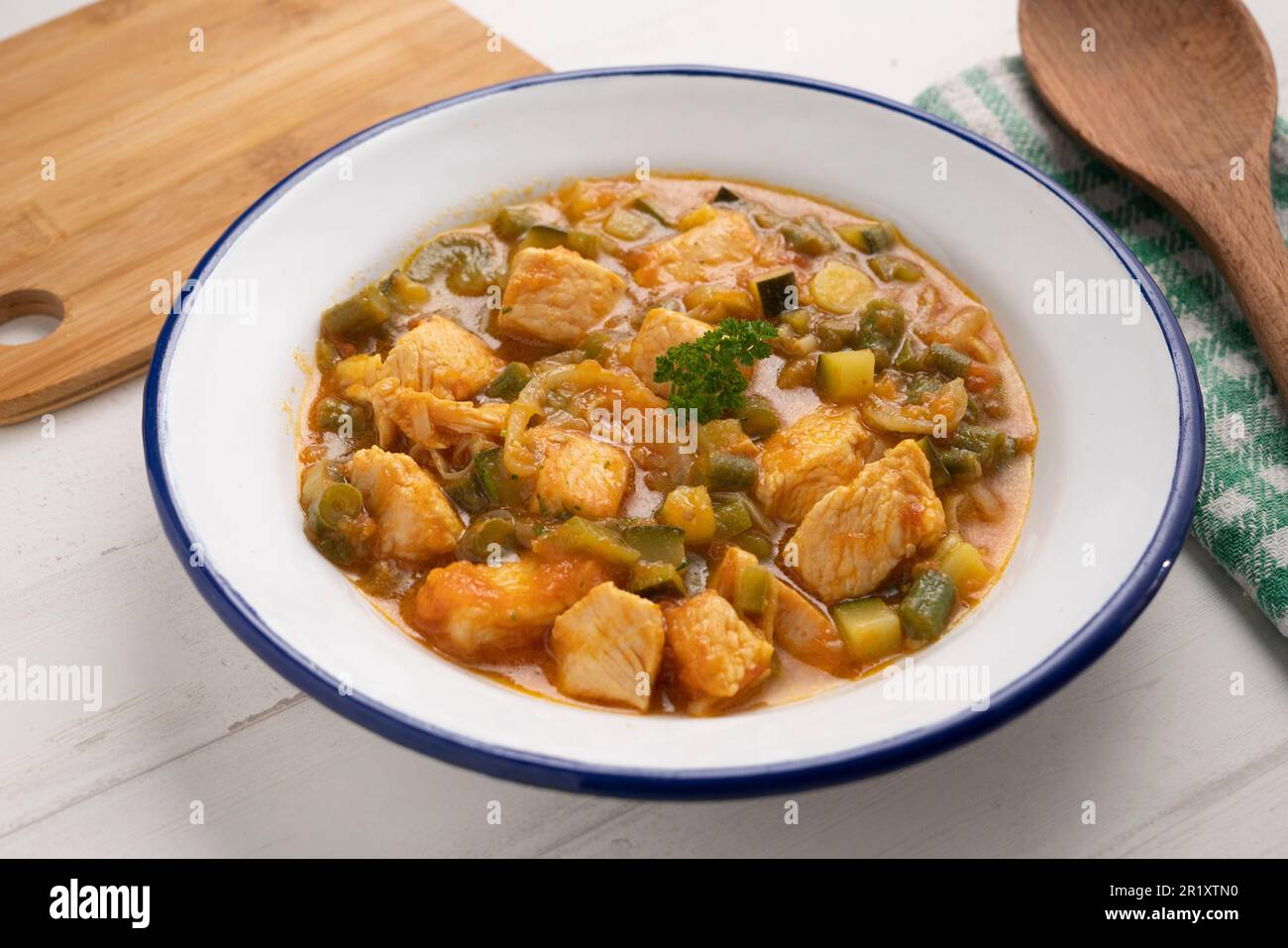 Cubed turkey tenderloin cooked with curry and vegetables Stock Photo ...
