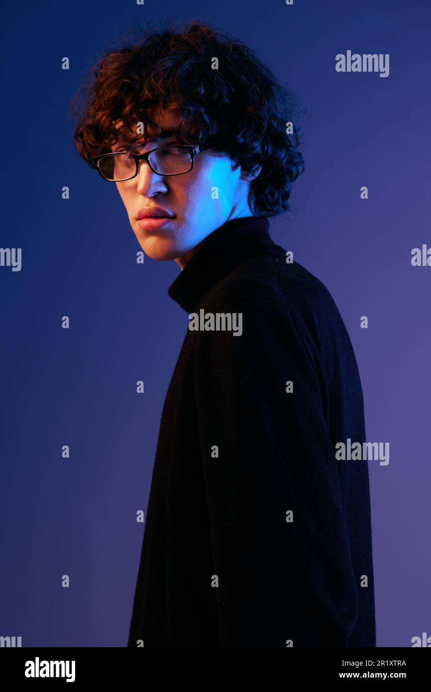 Male fashion portrait in black clothes model poses in glasses, hipster ...