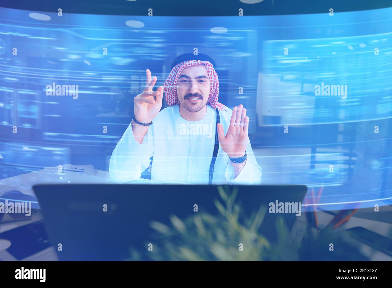 Muslim businessman working with floating data visualization screen ...