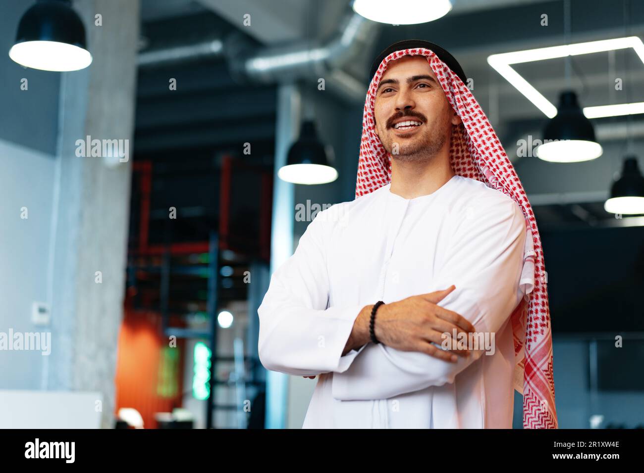 Successful muslim businessmen in traditional outfit in his office Stock ...